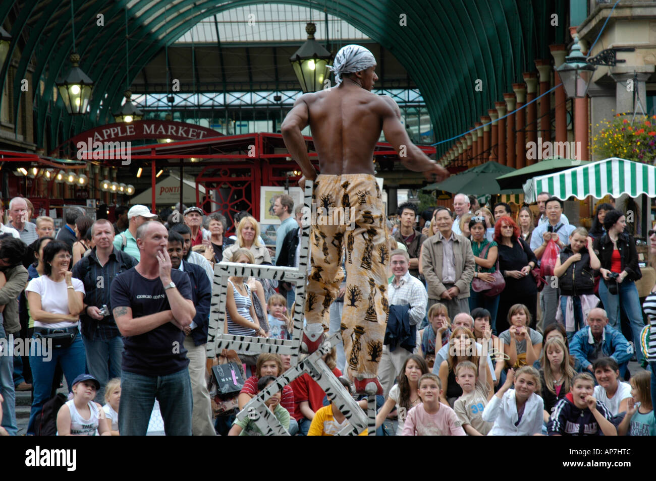 Street performer balancing chairs Covent Garden London UK Stock Photo ...