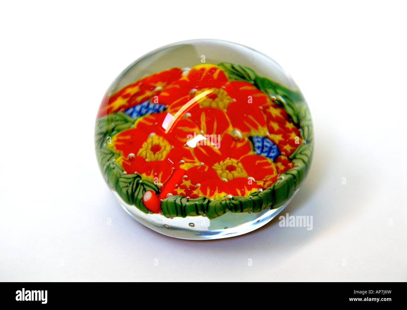 Glass paperweight with flower design Stock Photo - Alamy
