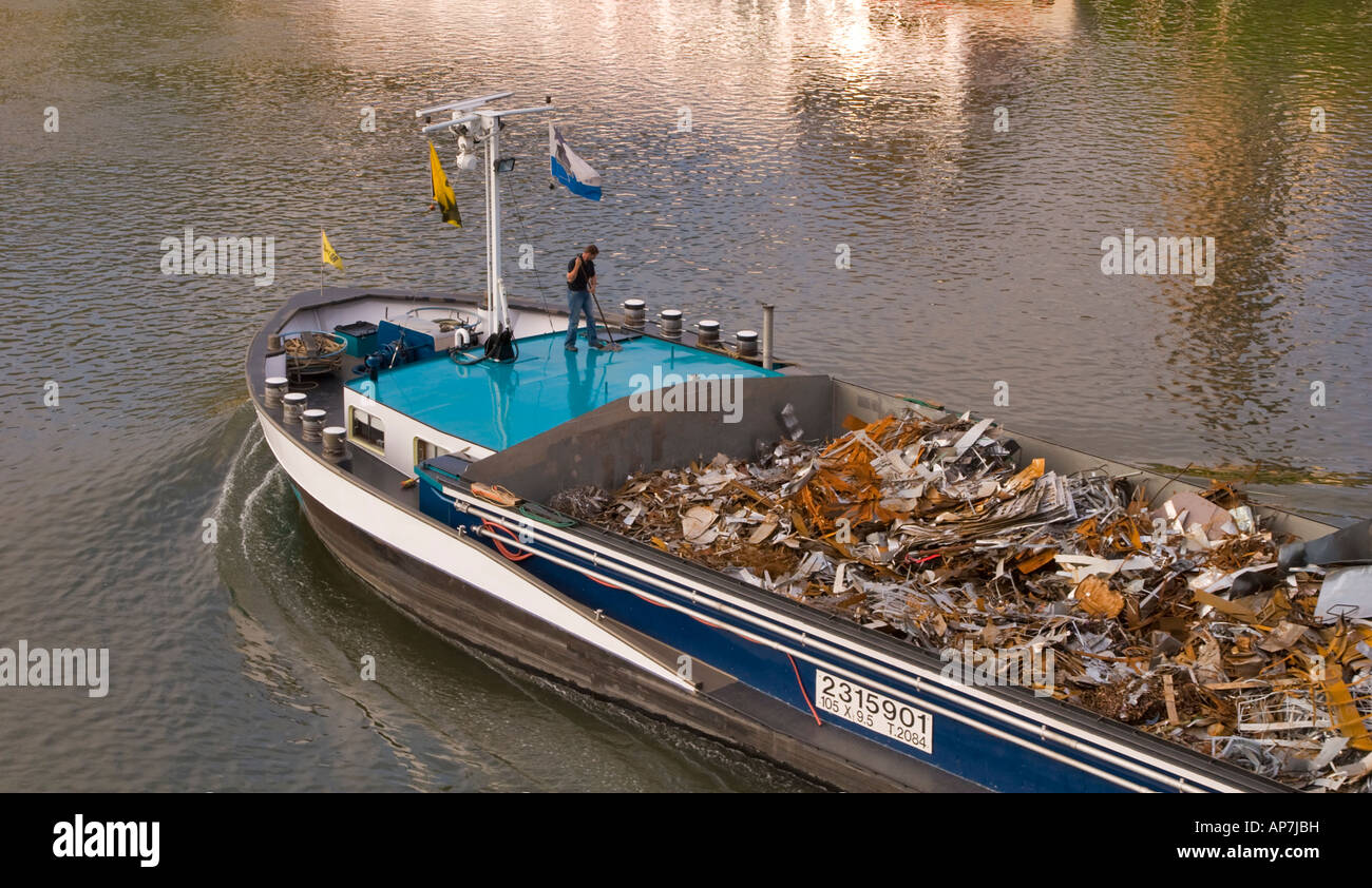 Barge with scrap metal on the Mosel River Stock Photo - Alamy