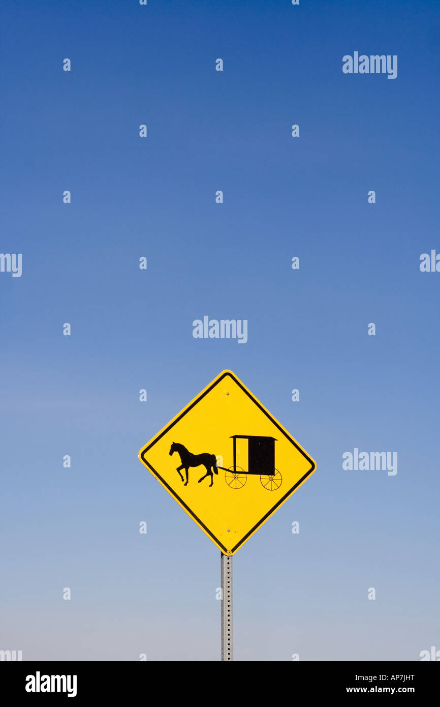 Road sign warning of horse-drawn buggys Stock Photo - Alamy