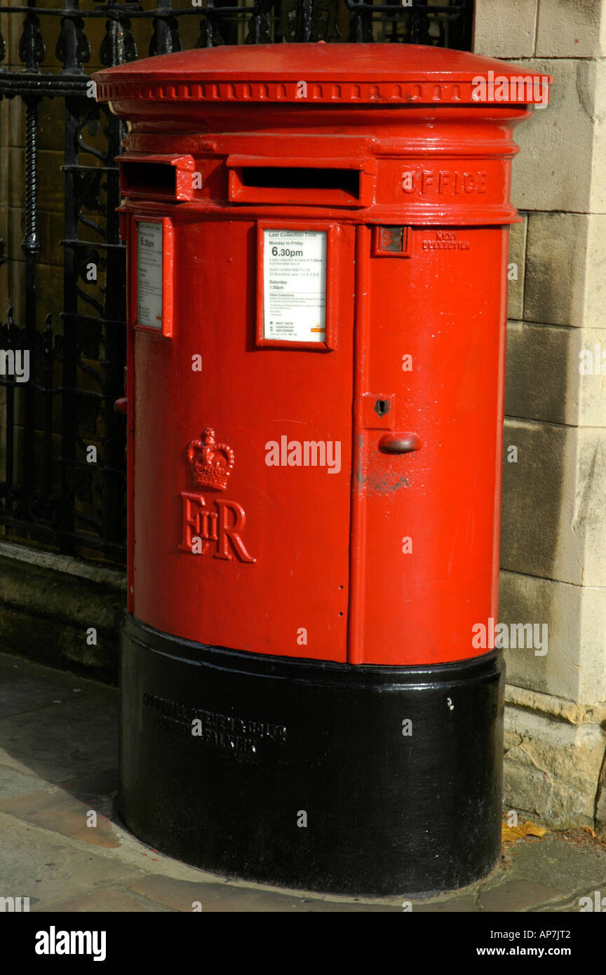 Red post box London UK Stock Photo - Alamy