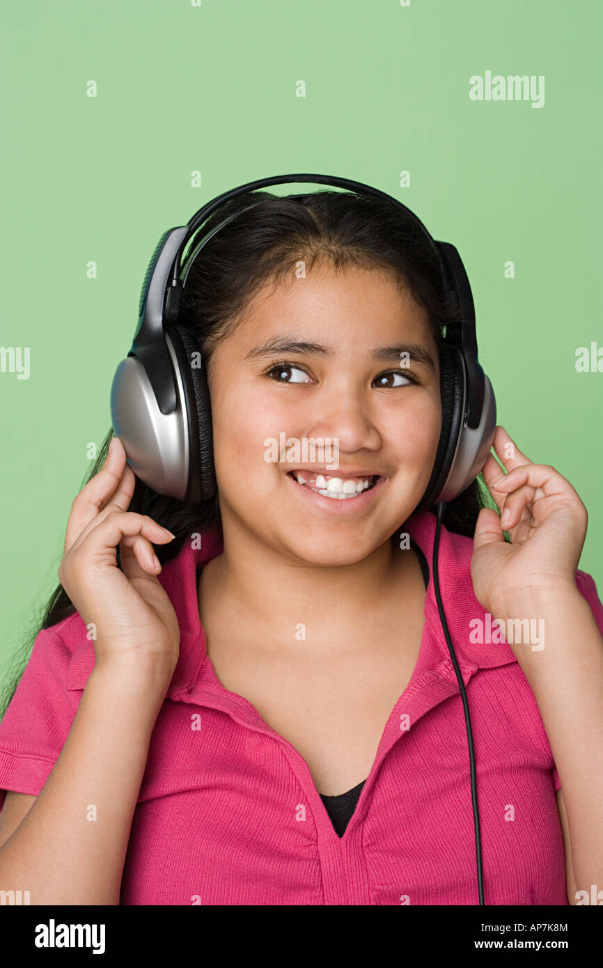 Girl wearing headphones Stock Photo - Alamy
