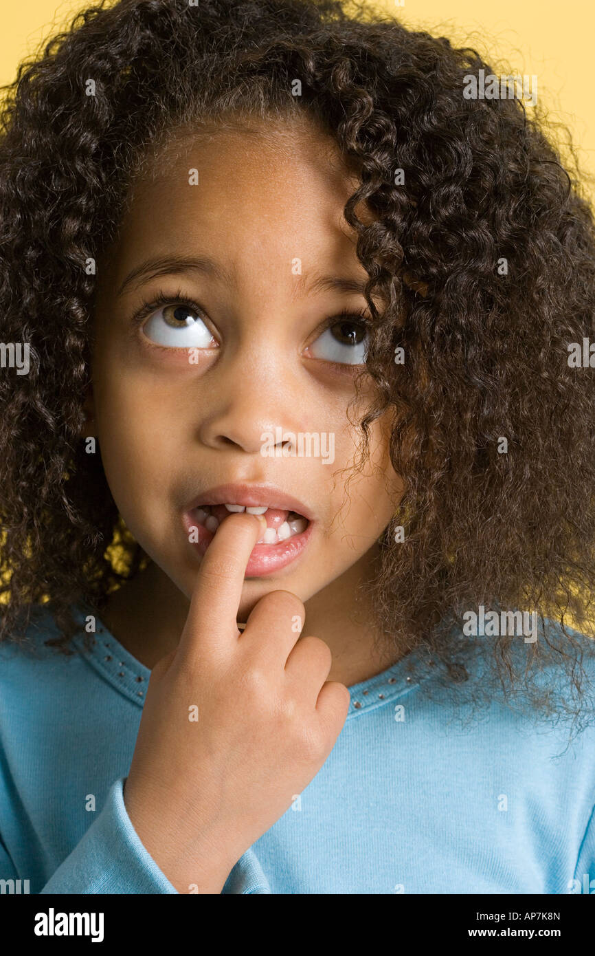 Girl looking confused Stock Photo - Alamy