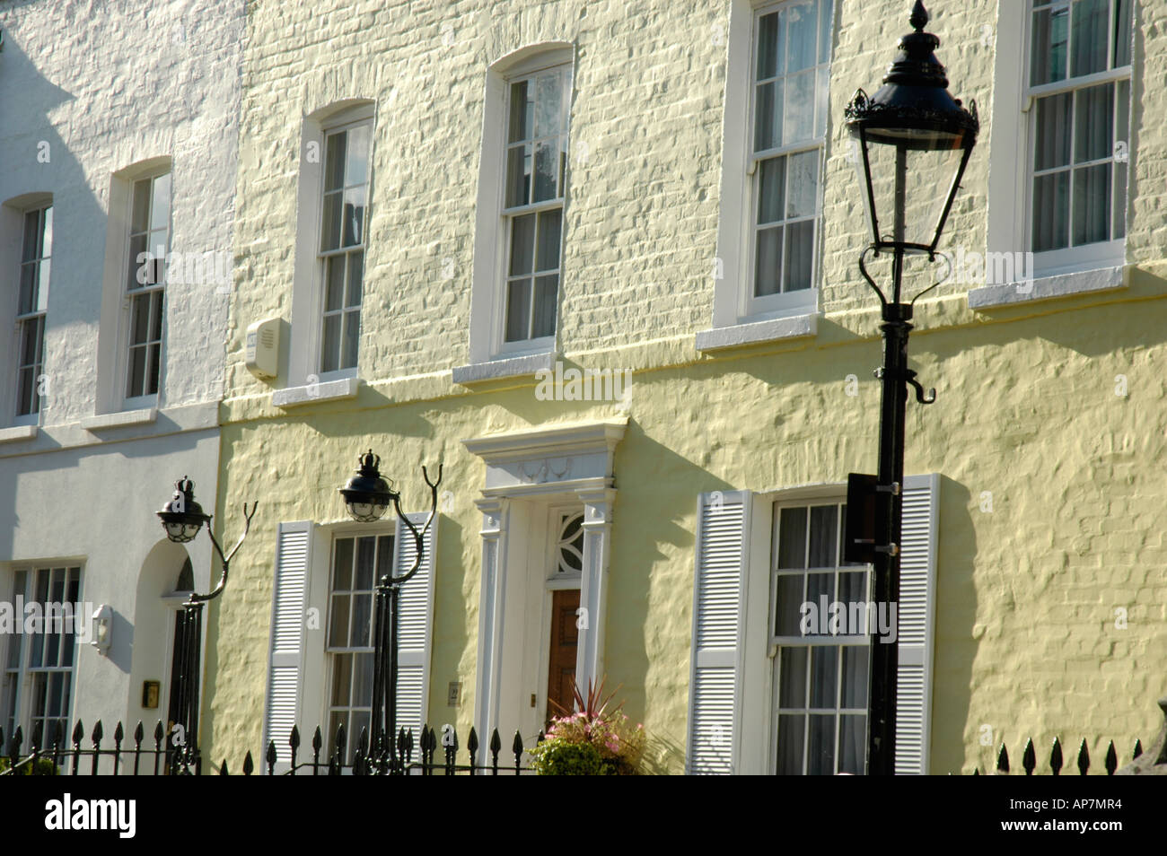 Pastel coloured painted brick houses in wealthy Kensington district of ...