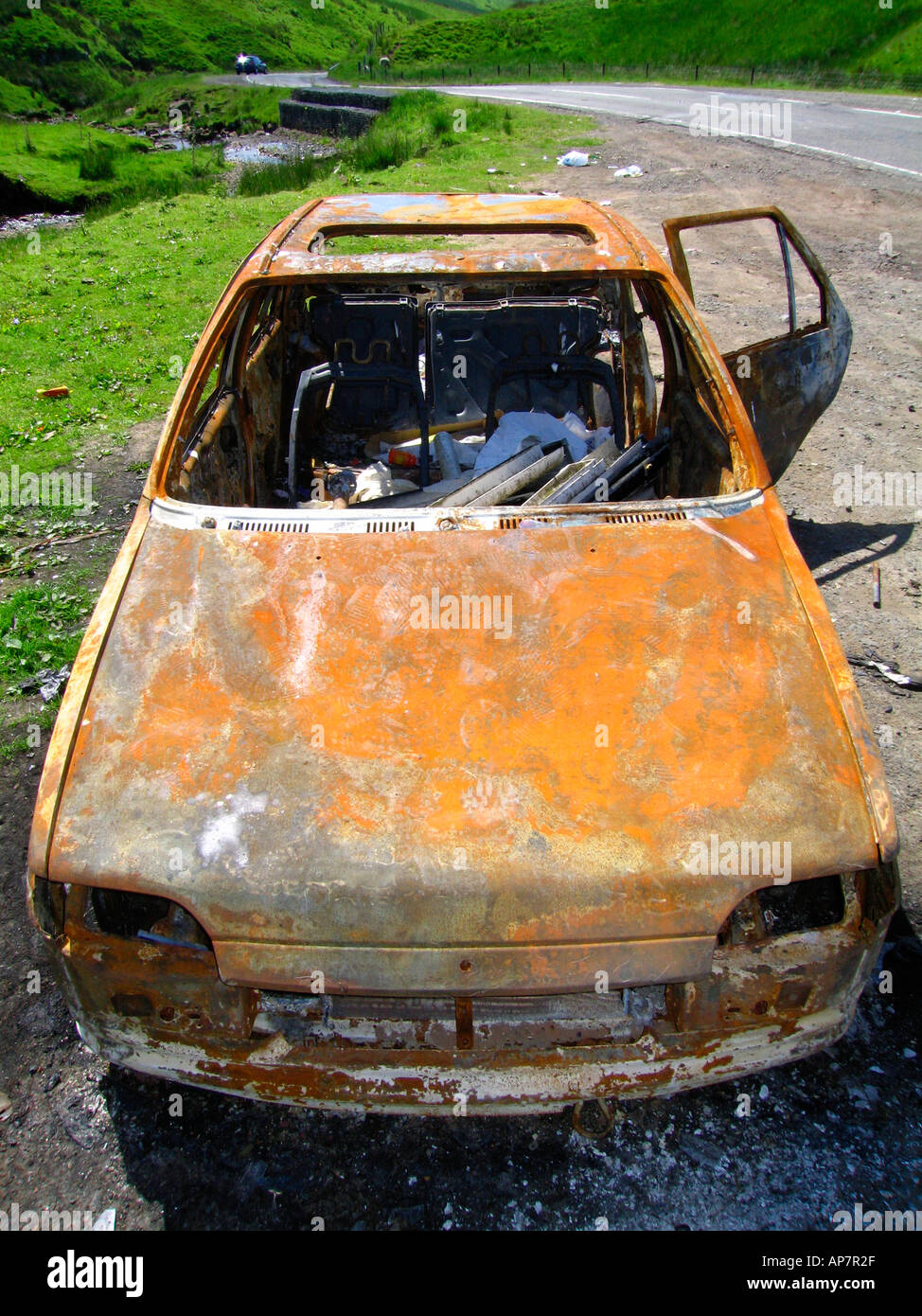 Abandoned rusty car wreck Stock Photo - Alamy