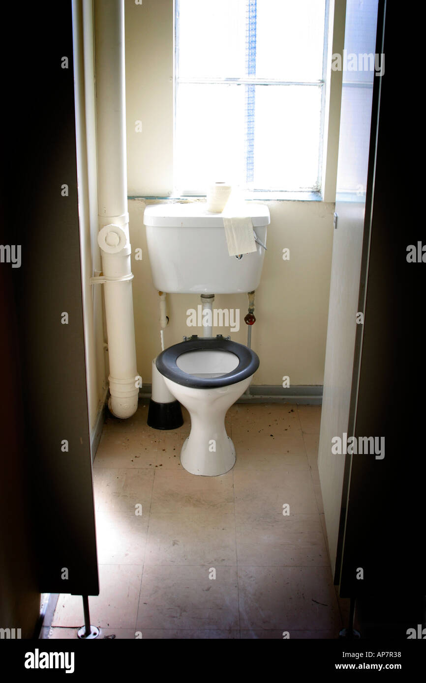 Factory toilet cubicle Stock Photo - Alamy