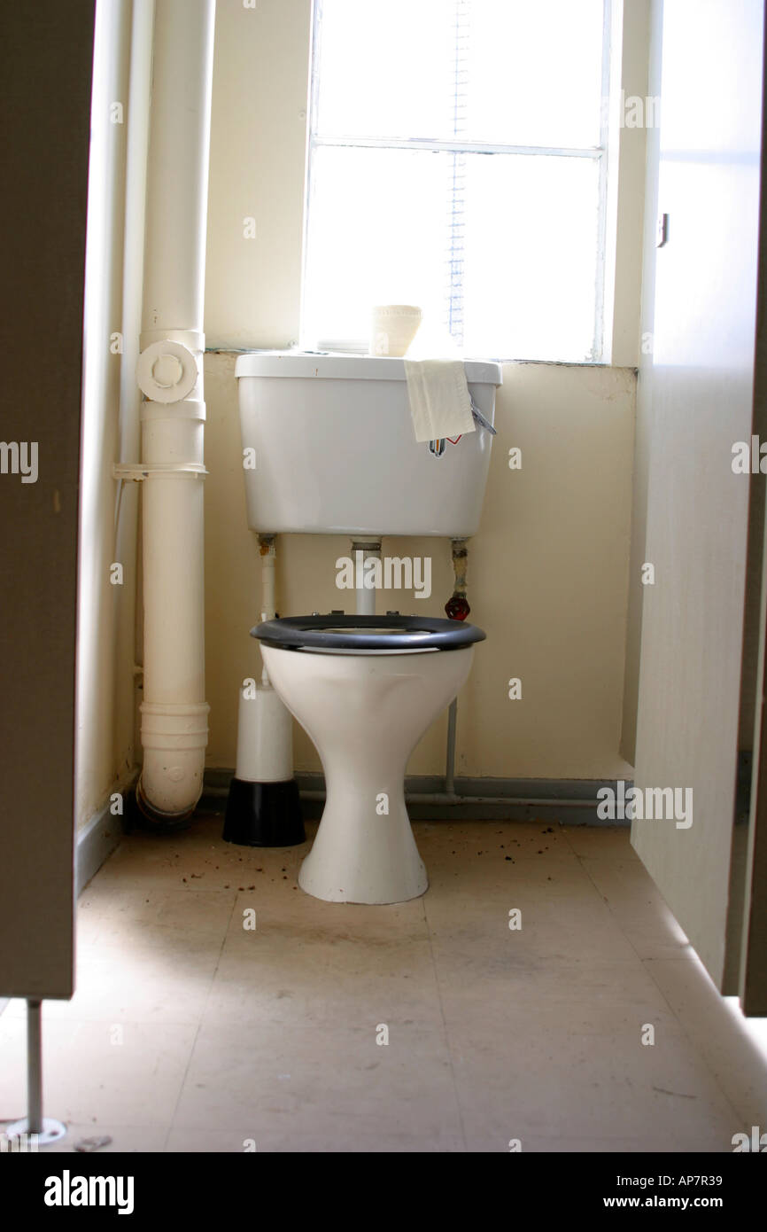 Factory toilet cubicle Stock Photo - Alamy