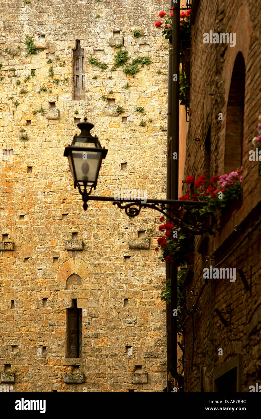 lantern in tuscany in front of bullet holed roman wall Stock Photo - Alamy