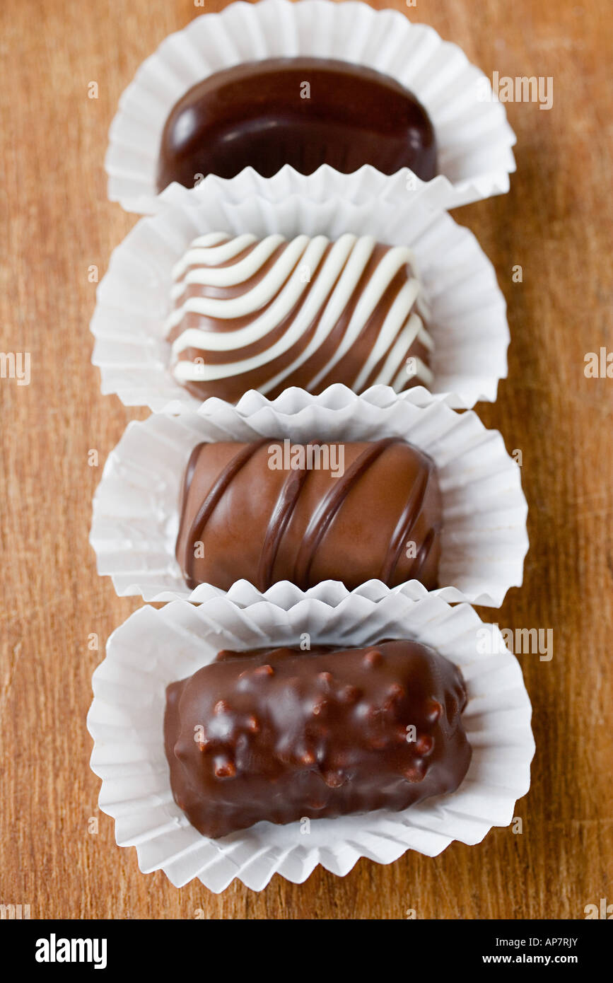 Chocolates in a row Stock Photo - Alamy