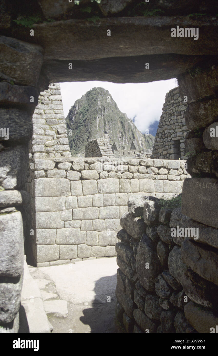 View of Macchu Pichu through other buildings on site Peru Stock Photo ...