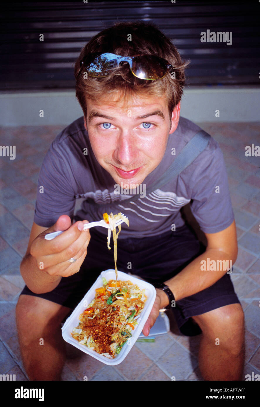 Man eating spicey food hi-res stock photography and images - Alamy