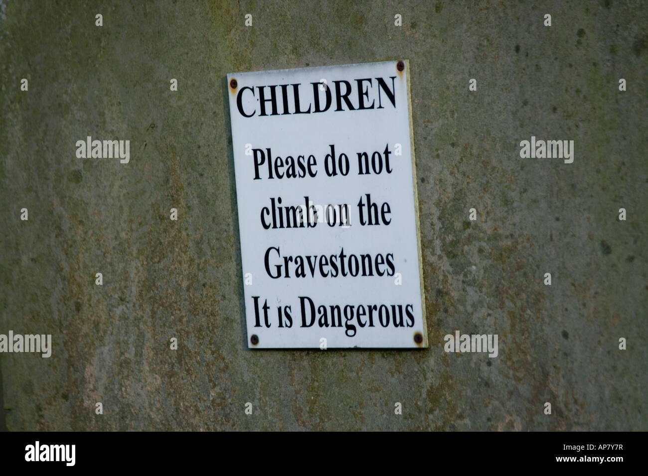 Health and safety sign on a gravestone in Castleton village church ...
