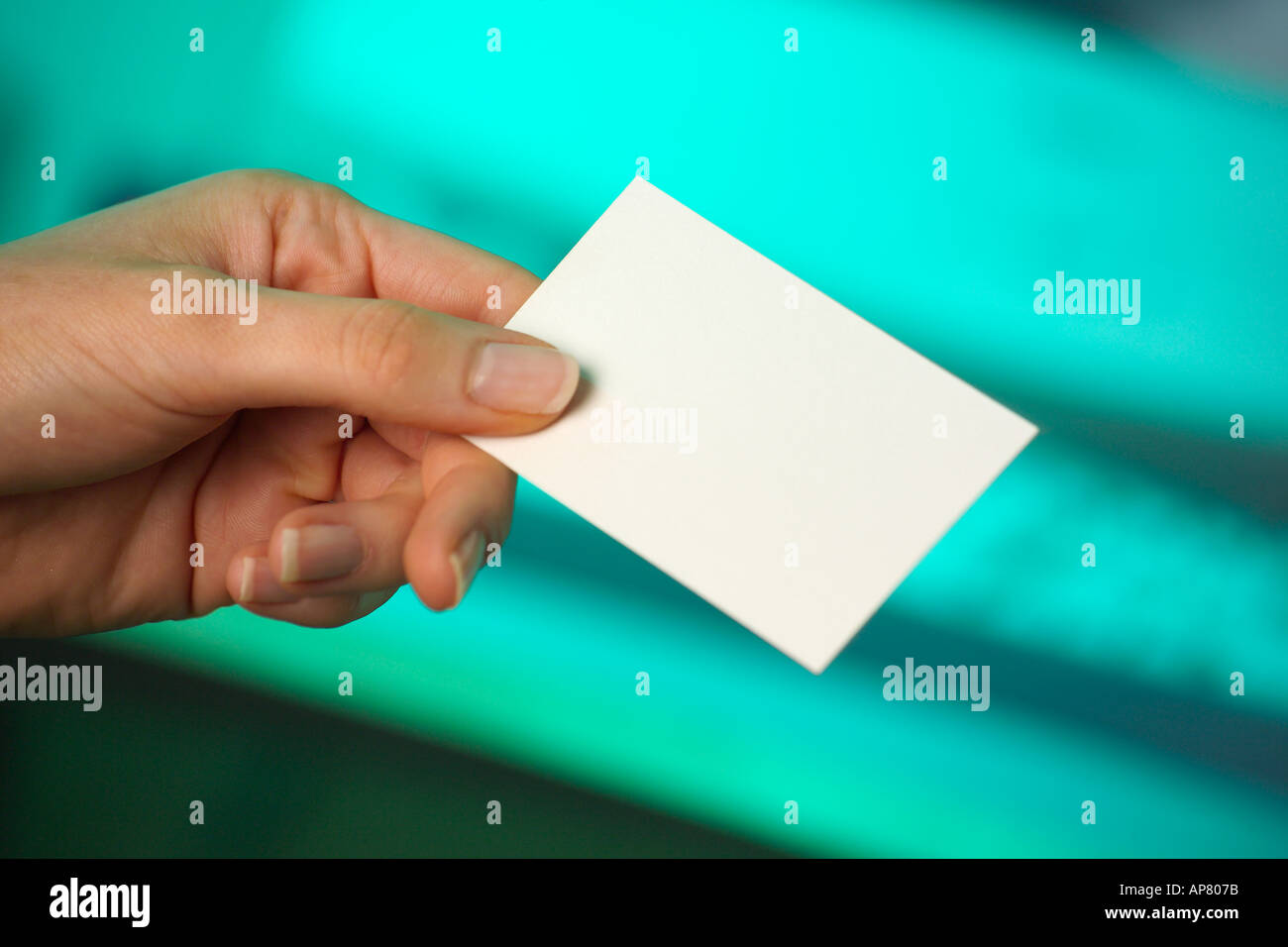 Hand holding businesscard Stock Photo - Alamy