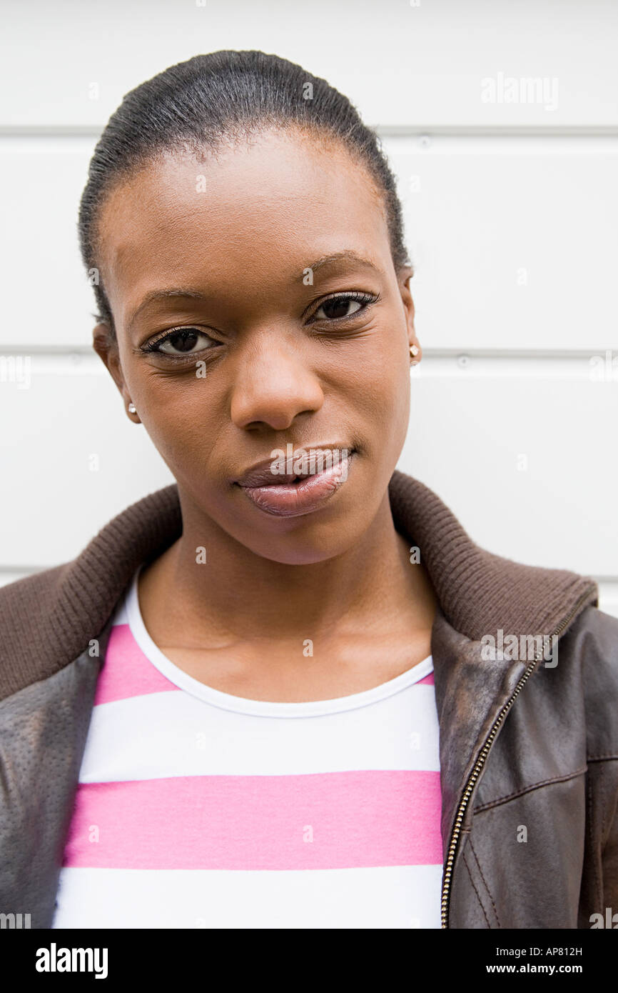 Headshot of a serious looking woman Stock Photo - Alamy