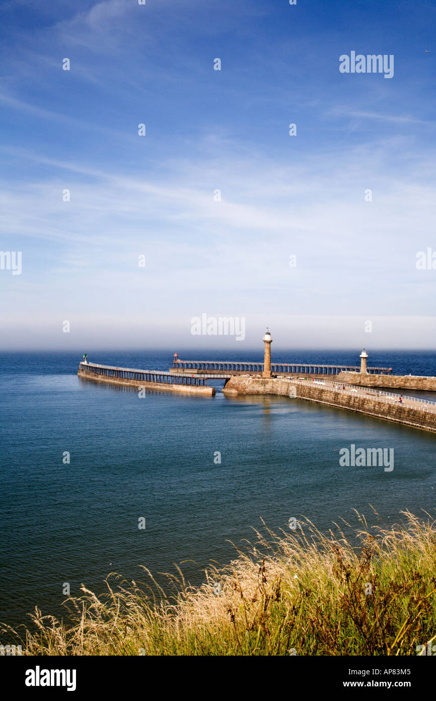 West and East Piers with a Sea Mist Looming Whitby North yorkshire ...