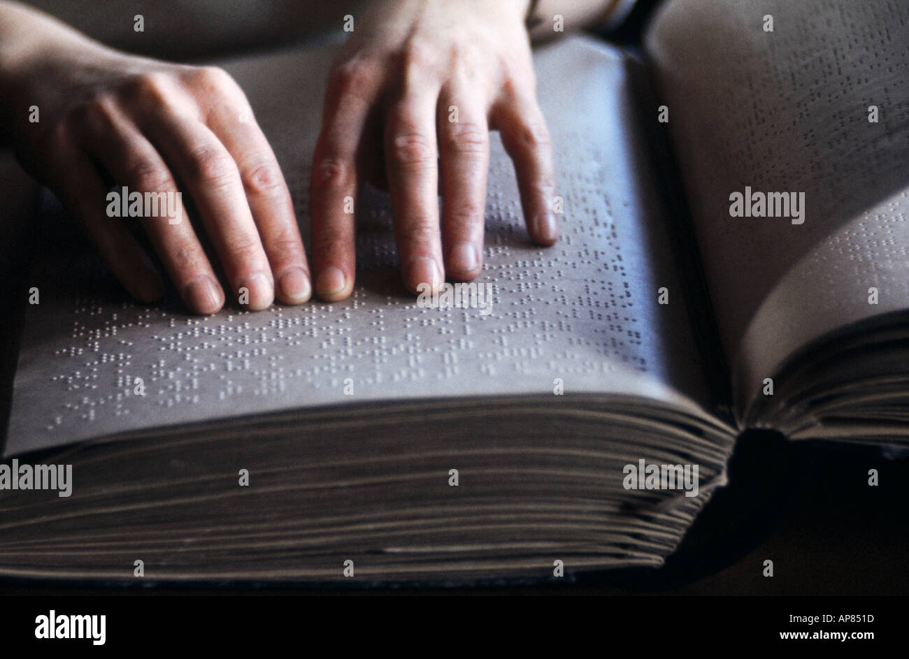 Hands reading braille hi-res stock photography and images - Alamy