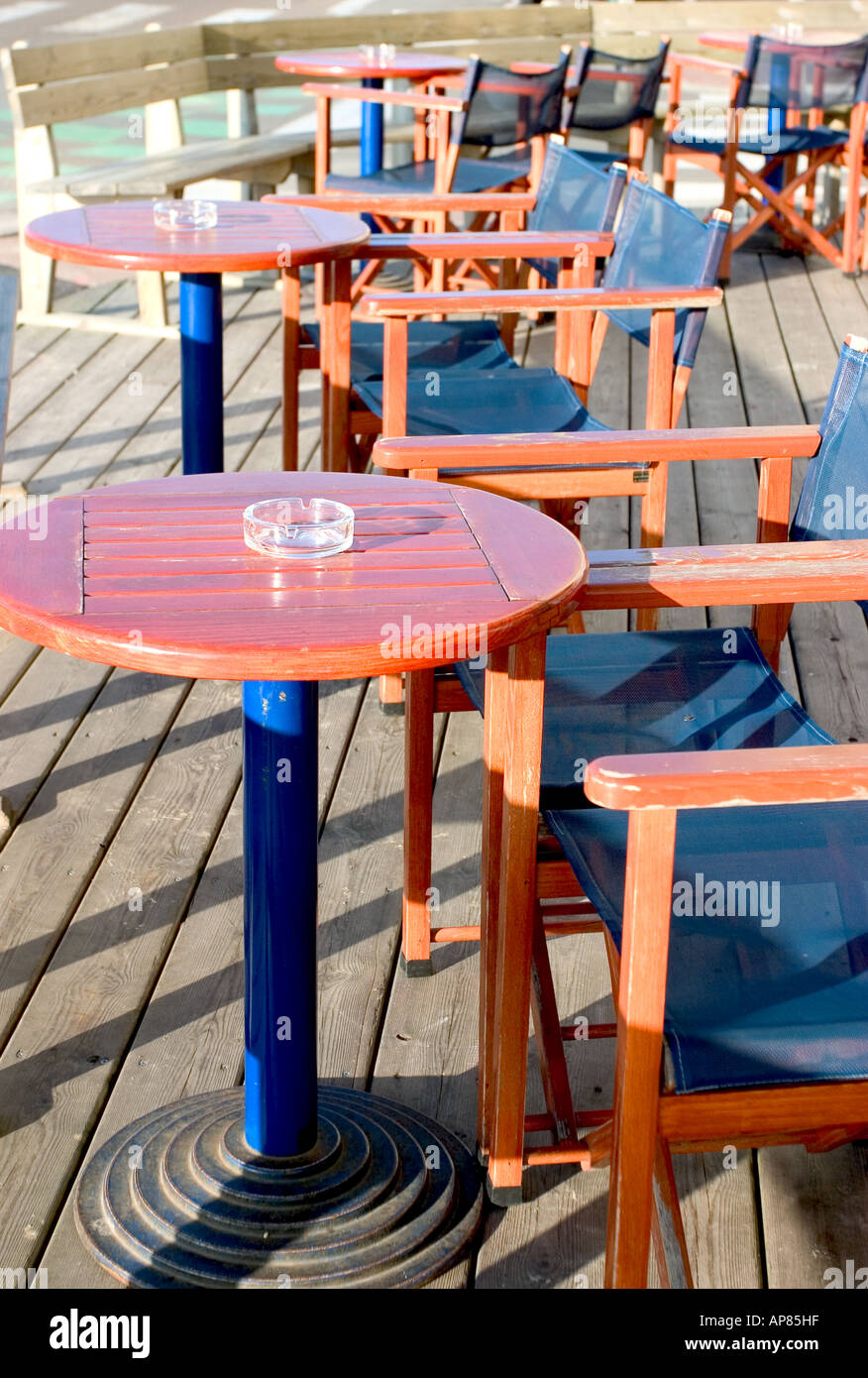 wooden chairs and table on bar outdoor Stock Photo - Alamy