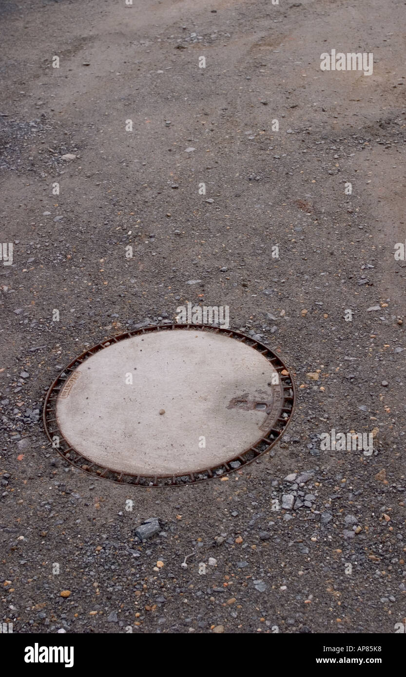 Urban texture and detail of sewer entry in a city of france Stock Photo ...