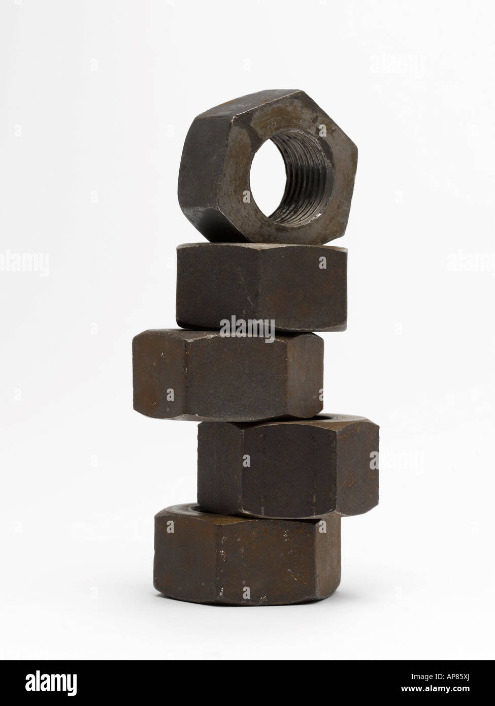 Pile of large metal nuts Stock Photo - Alamy