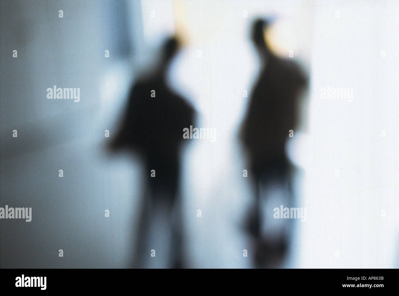 Silhouettes of men blurred Stock Photo - Alamy