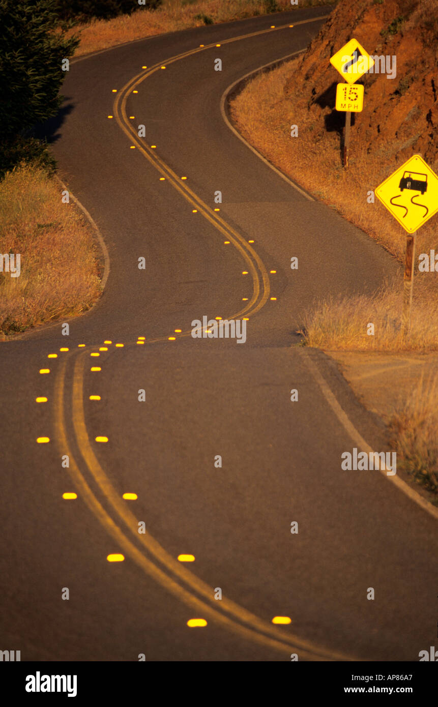 Warning signs along road in California USA Stock Photo - Alamy
