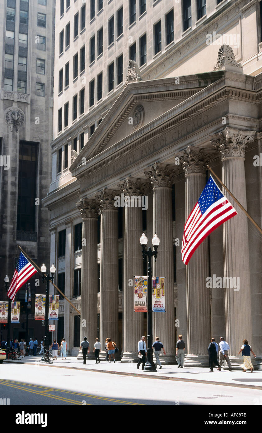 American flags in front of financial building, Federal Reserve Bank Of ...