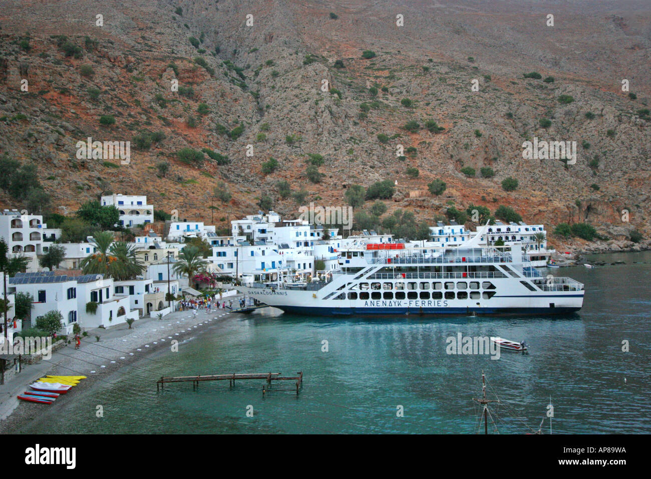 Ferry docking on the beach at Loutro in Southern Crete Stock Photo - Alamy