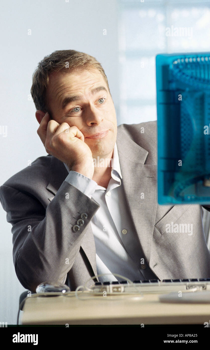 Male businessman working on computer hi-res stock photography and ...