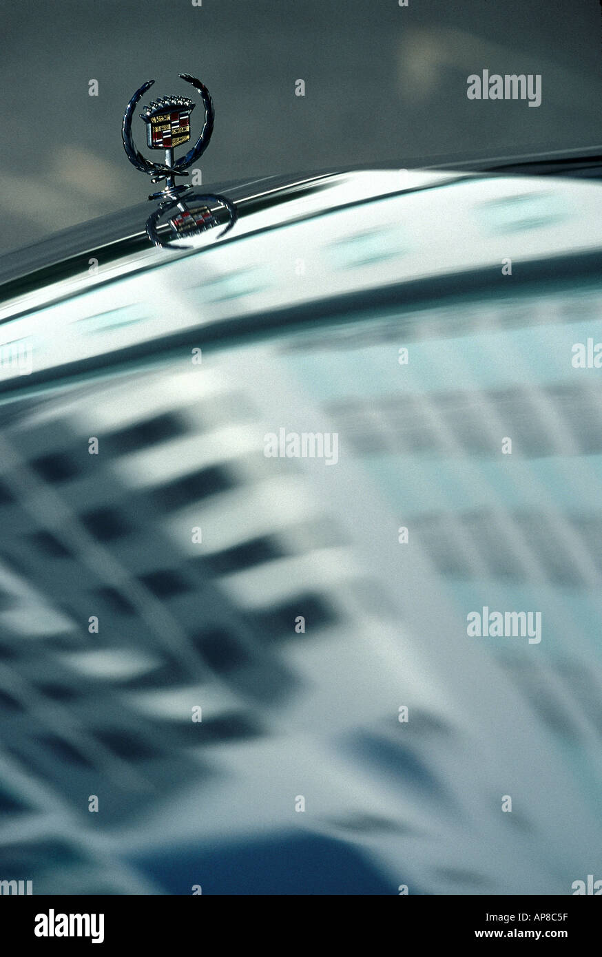 Reflection of building on hood of car Stock Photo - Alamy