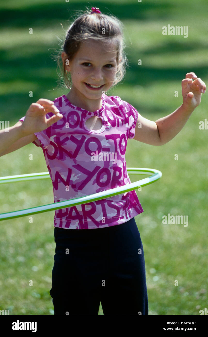Kid playing hoop hi-res stock photography and images - Alamy