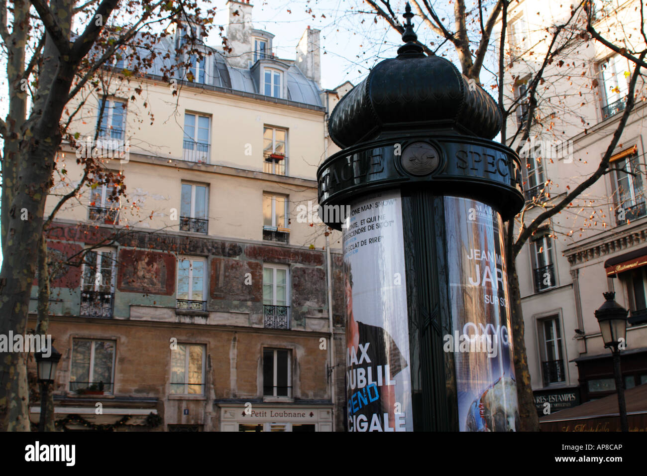 A traditional French advertising bollard on the Left Bank of the River ...