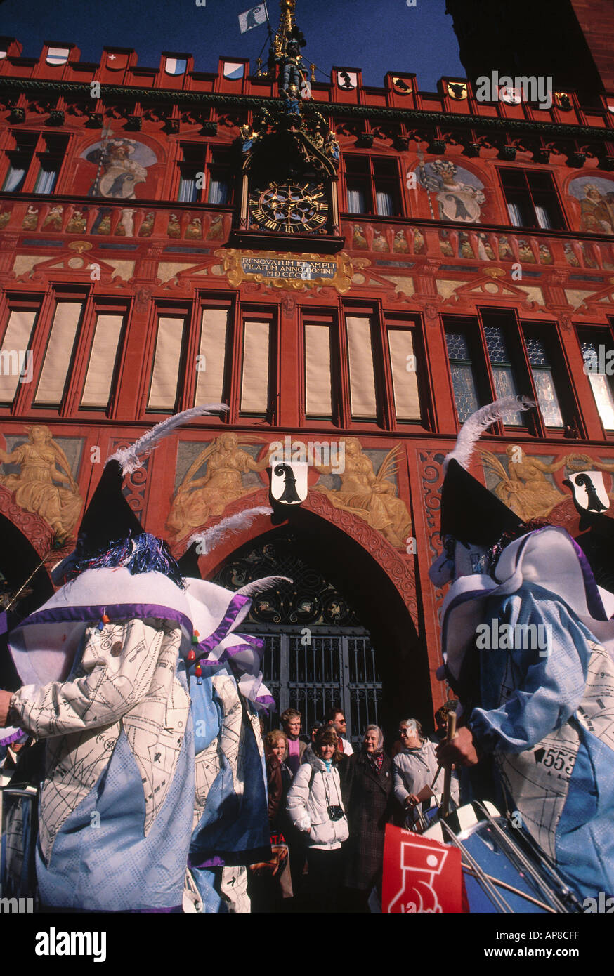 People in fasnacht parade at city hall, Carnival Of Basel, Basel ...