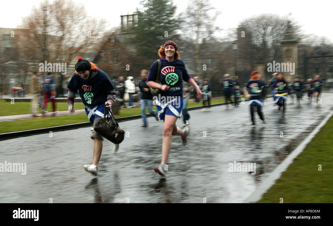 Runners taking part in the New Year 'One O'clock Run', Edinburgh, UK ...