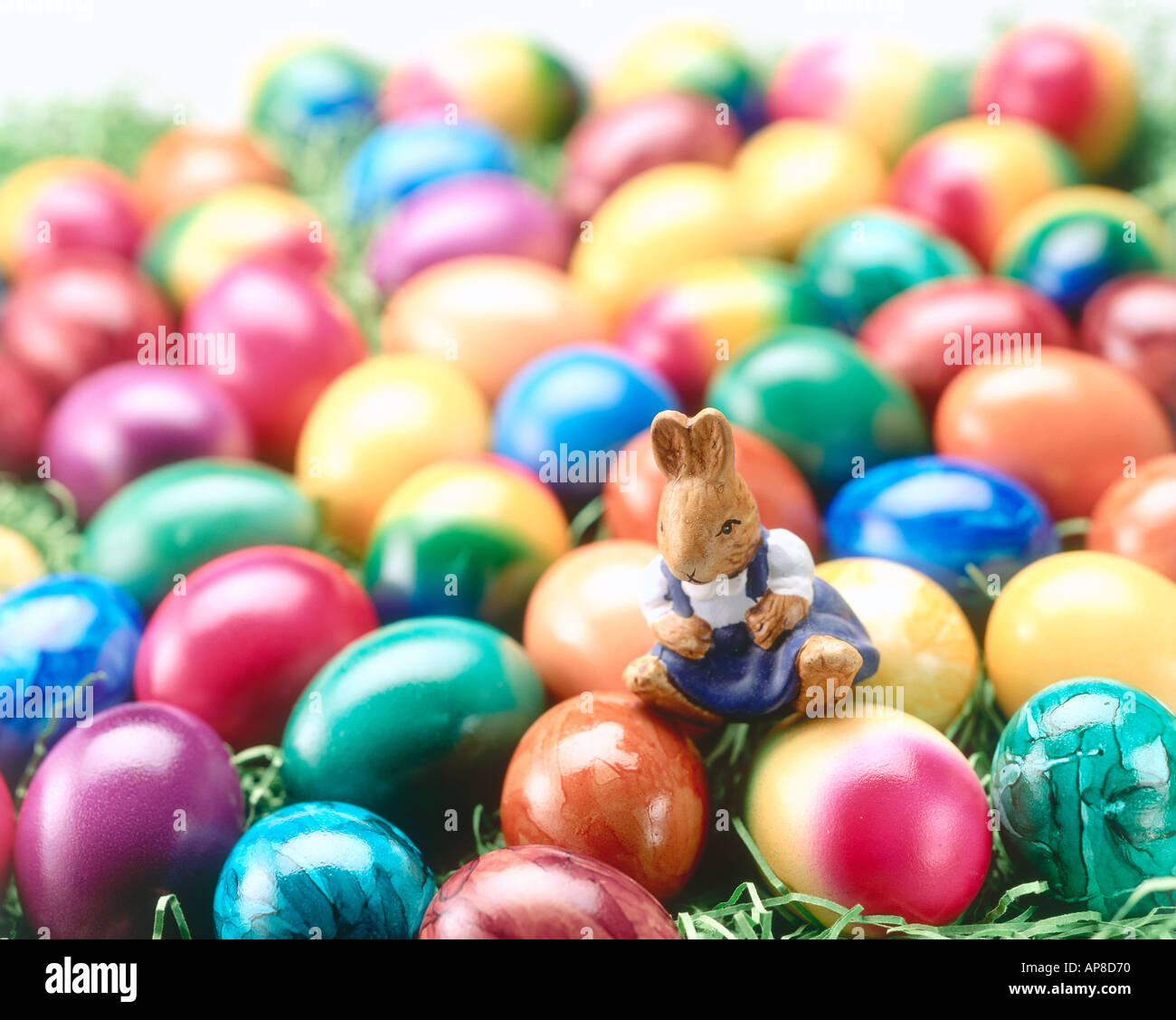 Easter bunny on colored eggs Stock Photo - Alamy