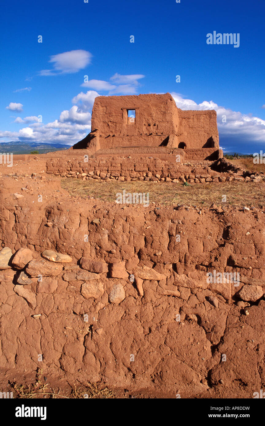 Morning light on the mission church and convento wall at Pecos Pueblo ...