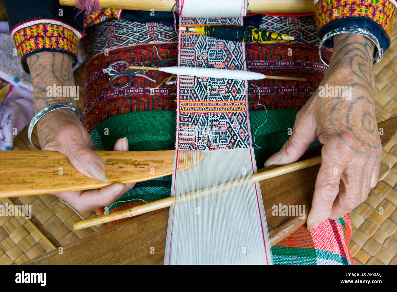 Li Woman Sewing on Hand Loom Hainan Island China Stock Photo - Alamy