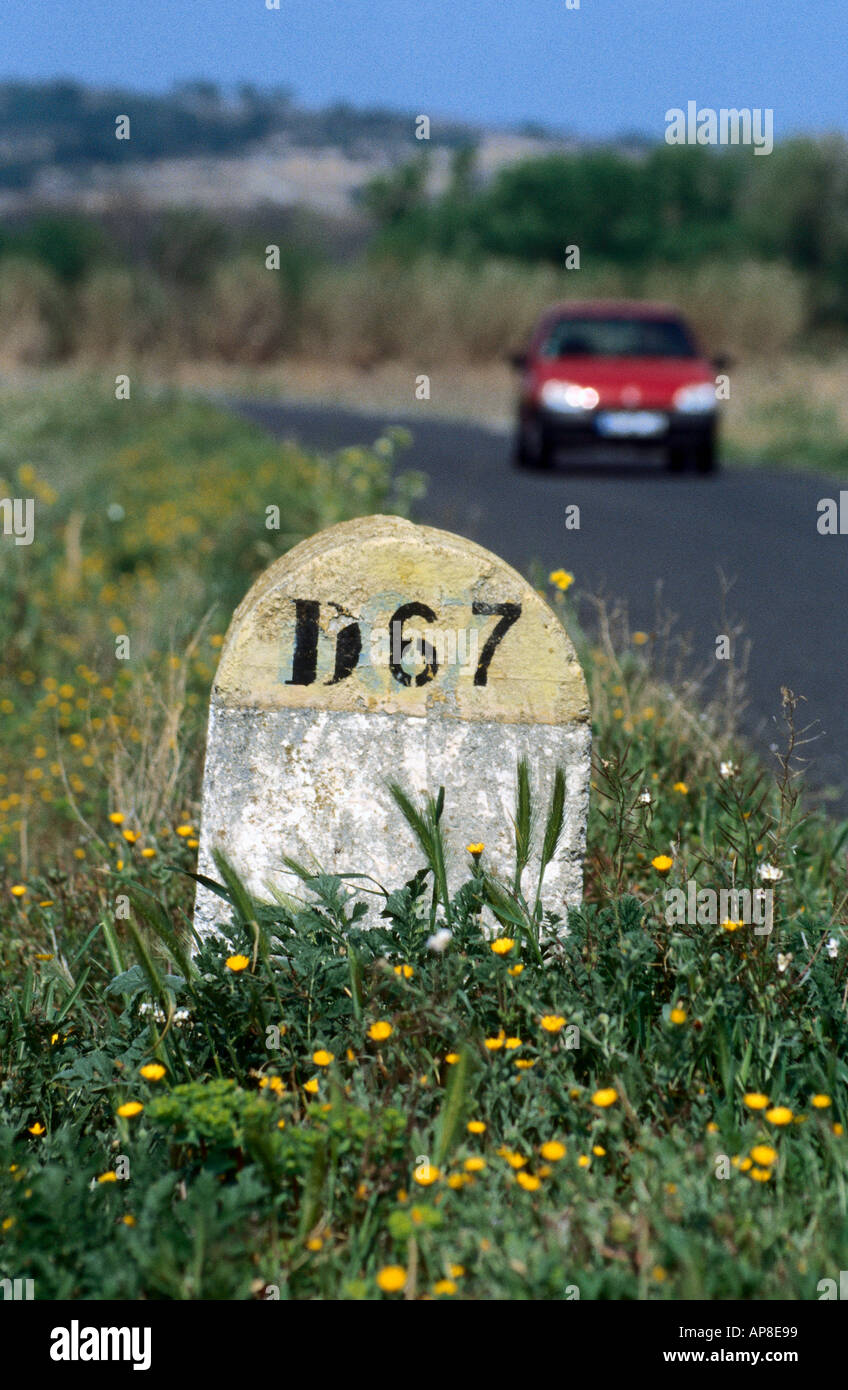 Road marking stone, Provence, France Stock Photo - Alamy