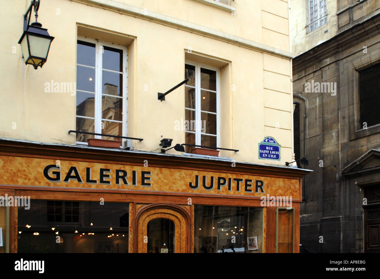 Lettering on the facade of a gallery in the Ile de la Cite area of ...