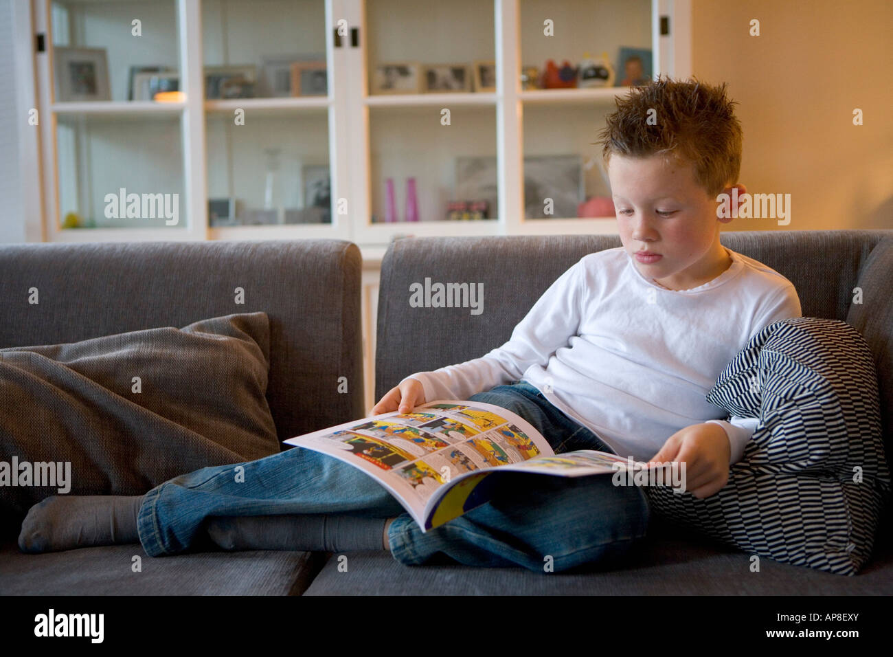 Boy reading comic hi-res stock photography and images - Alamy