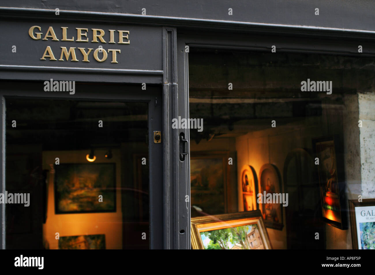 A Gallery window displaying paintings and drawings on the Ile de la ...
