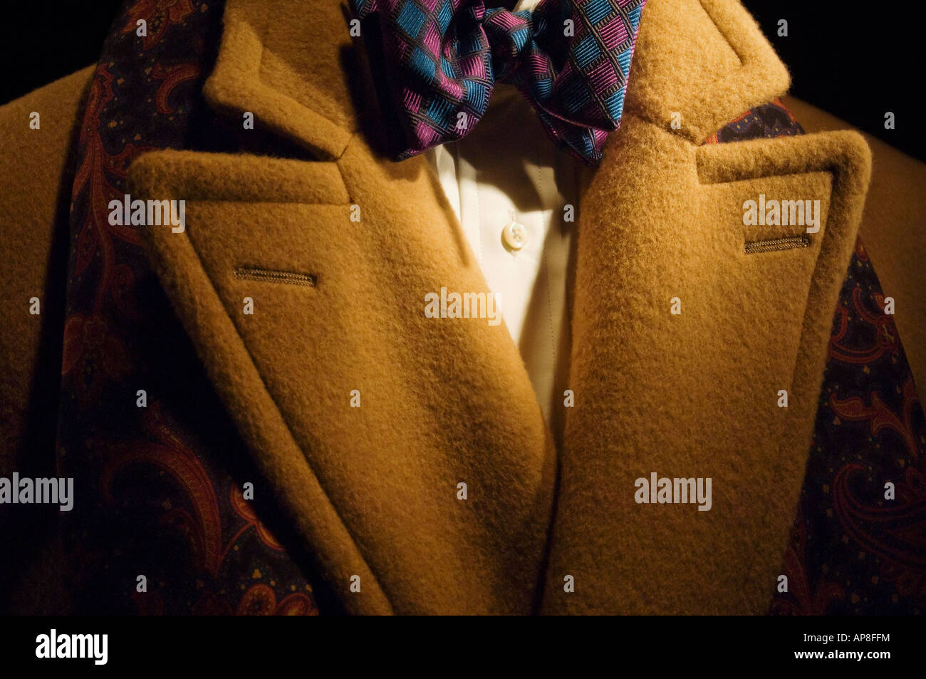 Camel coat collar and bow tie Stock Photo - Alamy