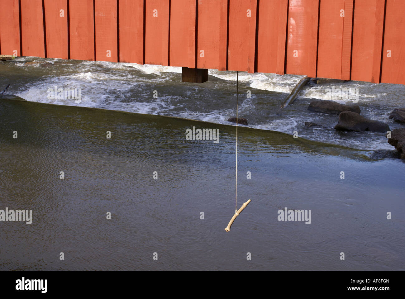Swing over River near Waterfall Stock Photo - Alamy
