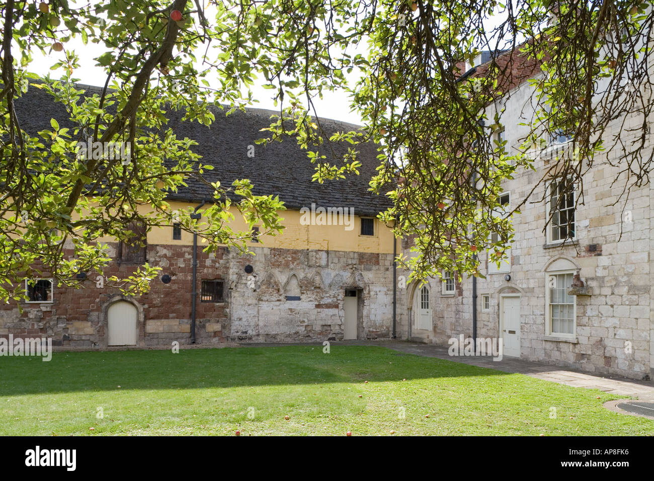 The medieval cloister (completed in 1239) beside the priory church of ...