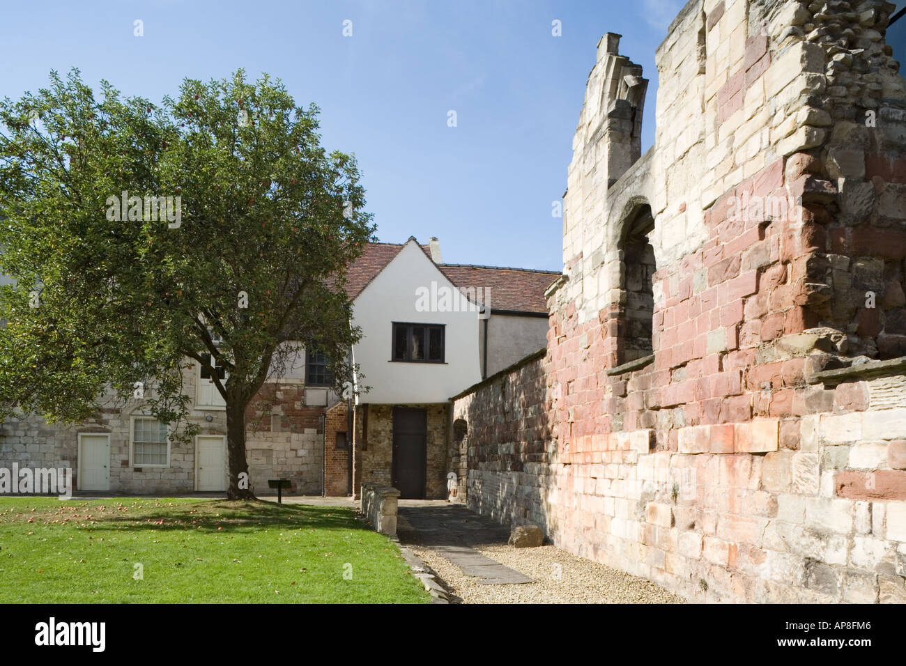 The medieval cloister (completed in 1239) beside the priory church of ...