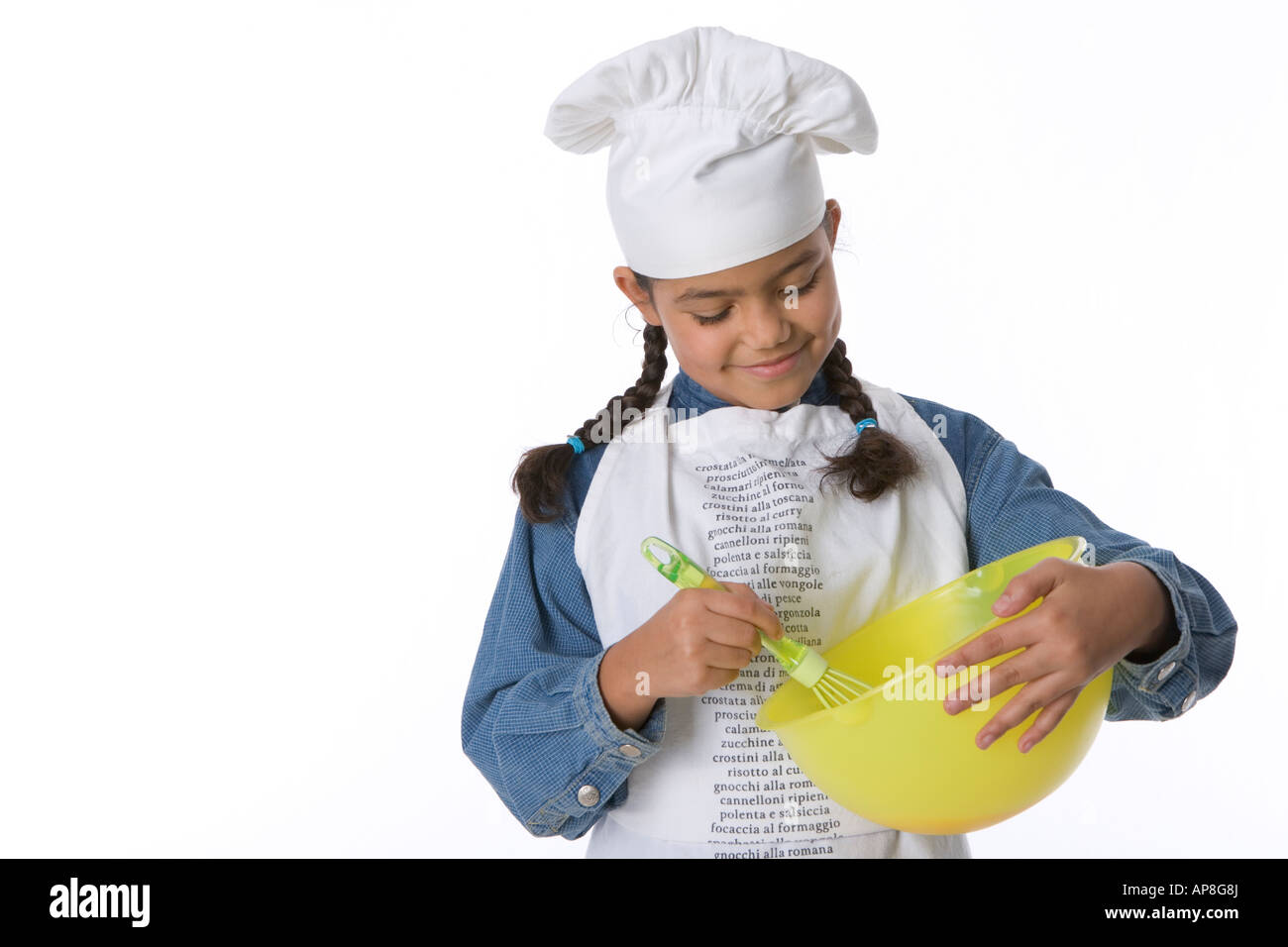 Girl is making batter for cakes Stock Photo - Alamy