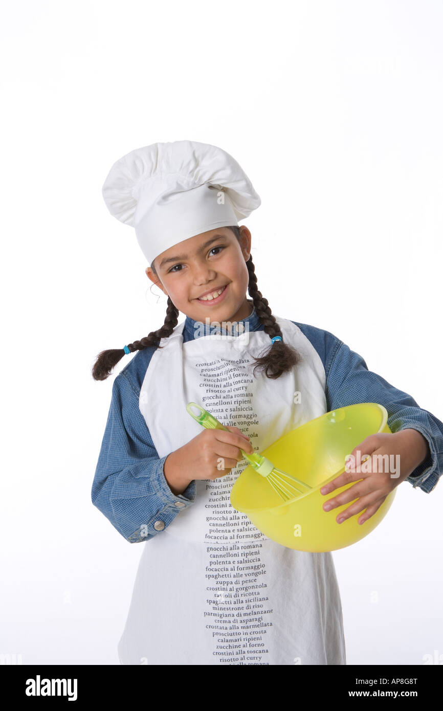 Girl is making batter for cakes Stock Photo - Alamy