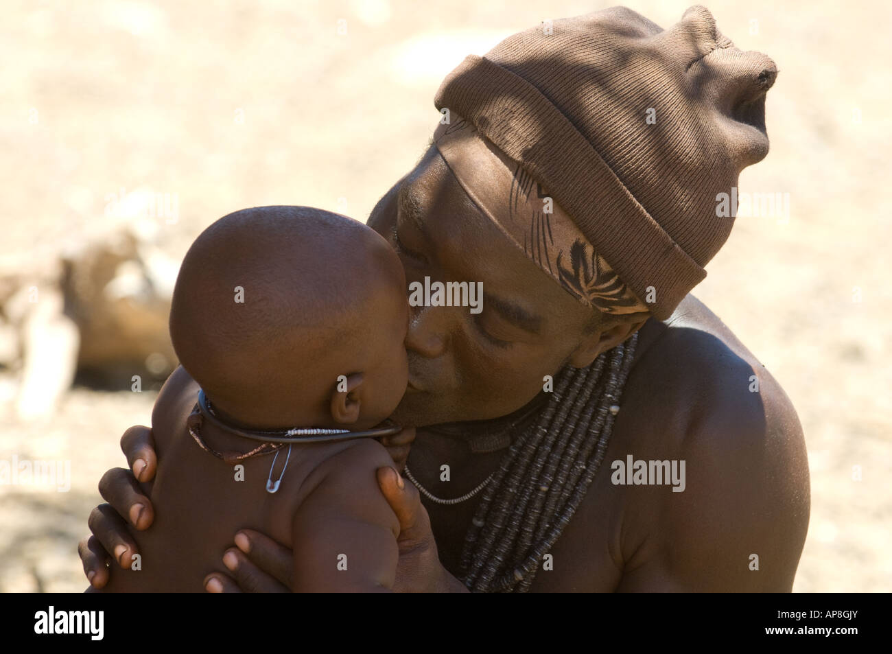 himba man with baby Stock Photo - Alamy