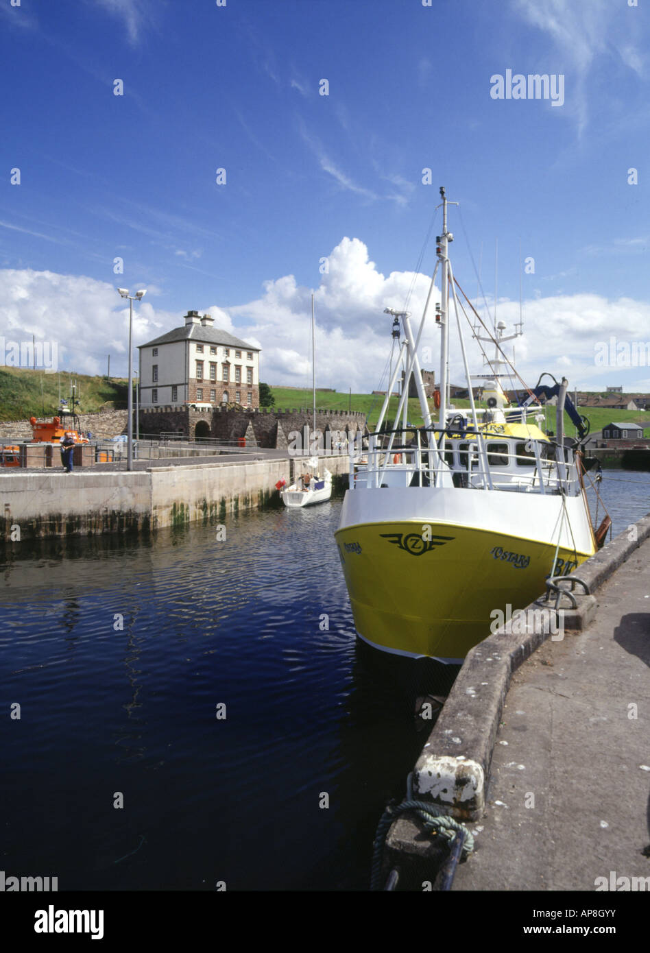 dh Harbour EYEMOUTH BORDERS Fishing boat at quayside Gunsgreen House ...