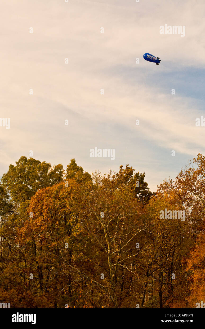 A blimp in the sky with a Now Leasing sign Stock Photo - Alamy