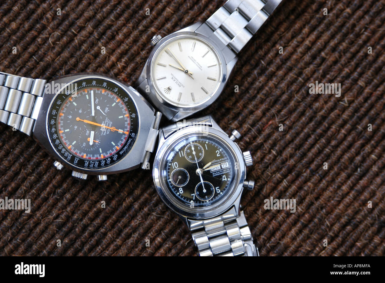 Three different watches Stock Photo - Alamy
